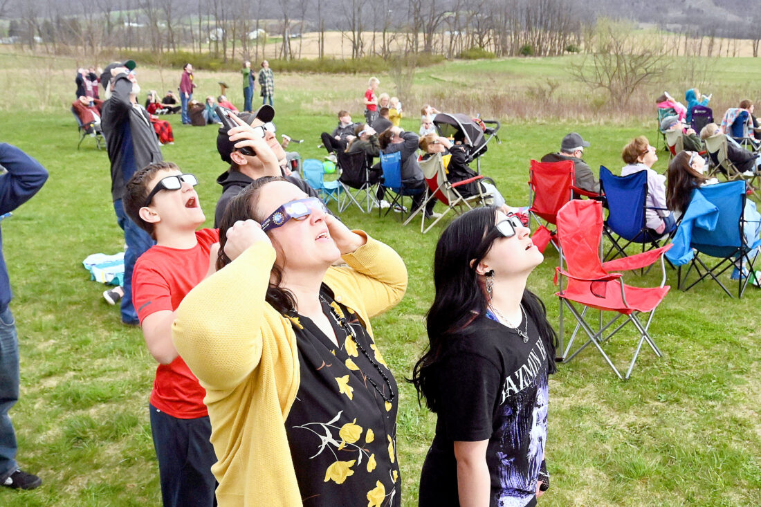Celestial spectacle: Hundreds gravitate to Fort Roberdeau to view solar ...